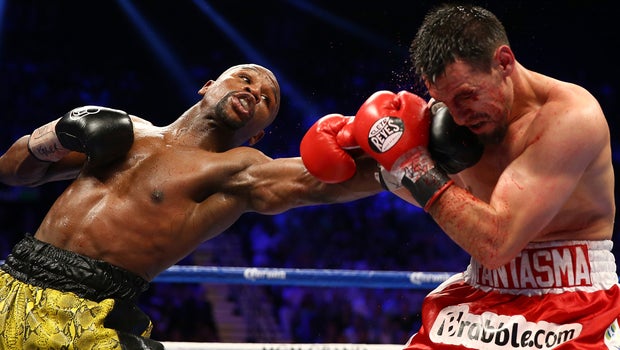 Playing defense, Floyd Mayweather Jr. dominates Robert Guerrero - CBS News