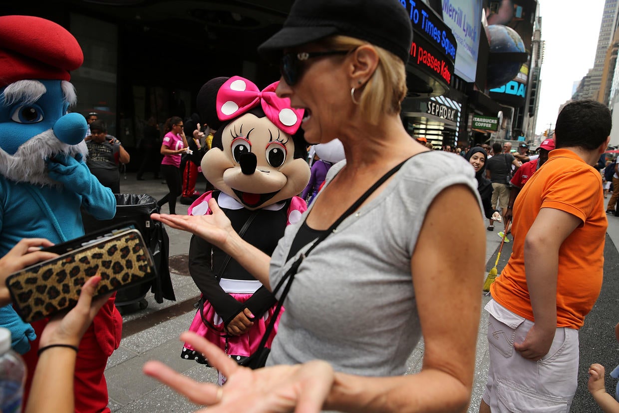 questions-over-times-square-characters-costumed-characters-in-new