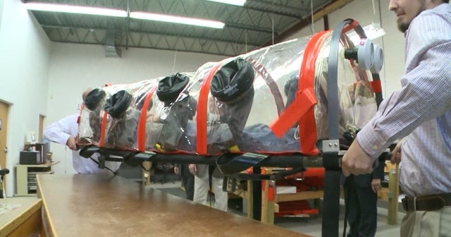 Portable isolation chamber could help contain Ebola - CBS News