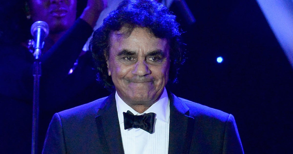 Johnny Mathis' longtime home damaged by a fire - CBS News