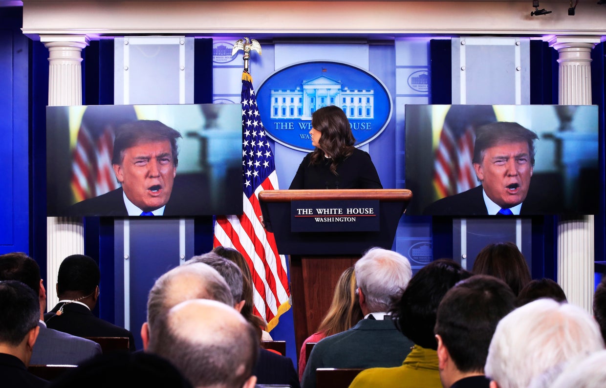 Trump makes appearance in White House briefing room, but on screen ...