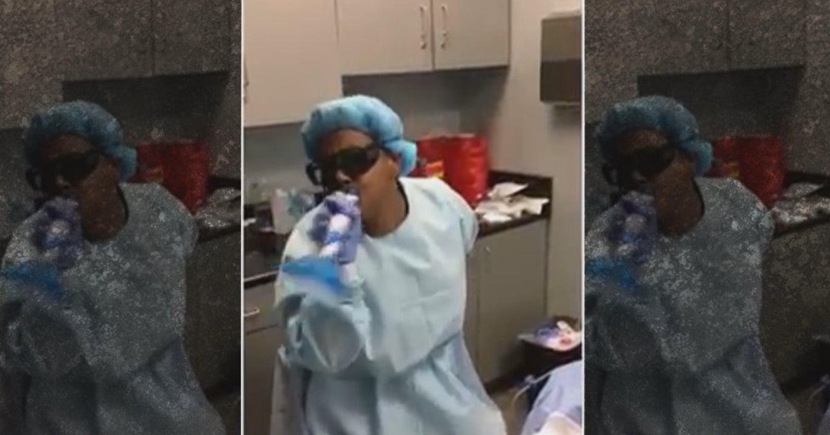 Doctor seen singing and dancing during surgery called "threat to public ...