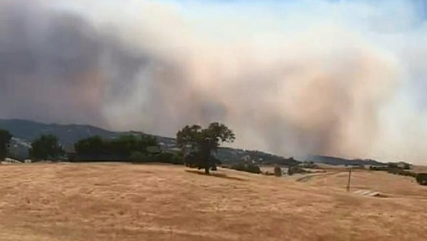 Thousands of firefighters battling massive wildfires in western U.S ...
