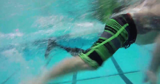 First prosthetic "fin" helps amputees swim again - CBS News