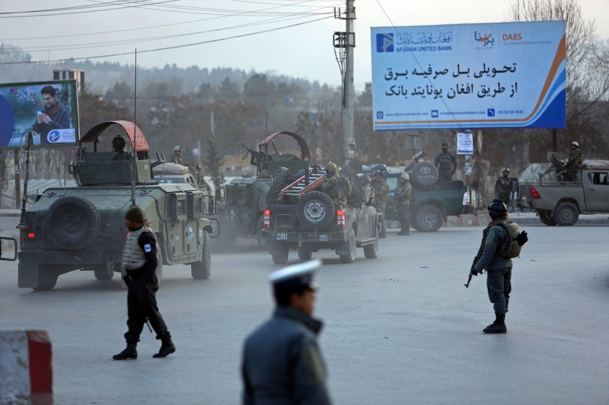 Militants attack government building in Kabul, killing dozens - CBS News