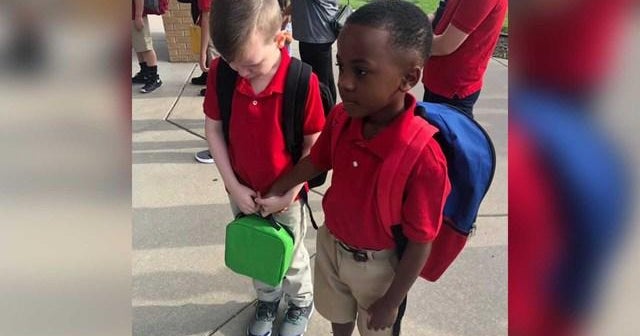 Boy consoles crying classmate with autism on first day of school - CBS News