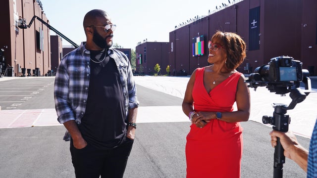 Dog helps rescue deer stranded in body of water - CBS News