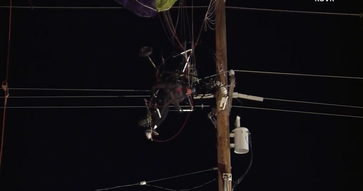 Paraglider caught in power lines rescued in California - CBS News